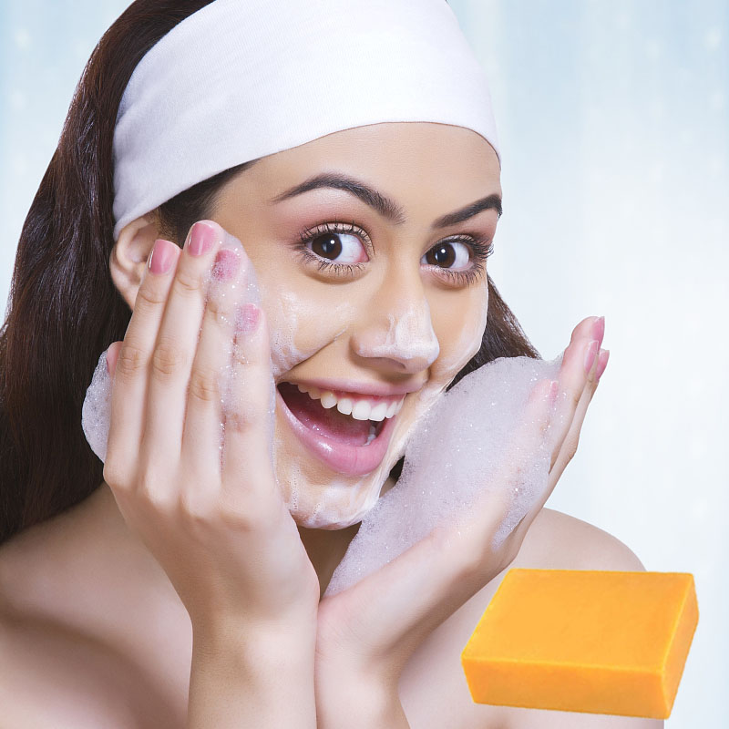 How do I use soap to wash my face?